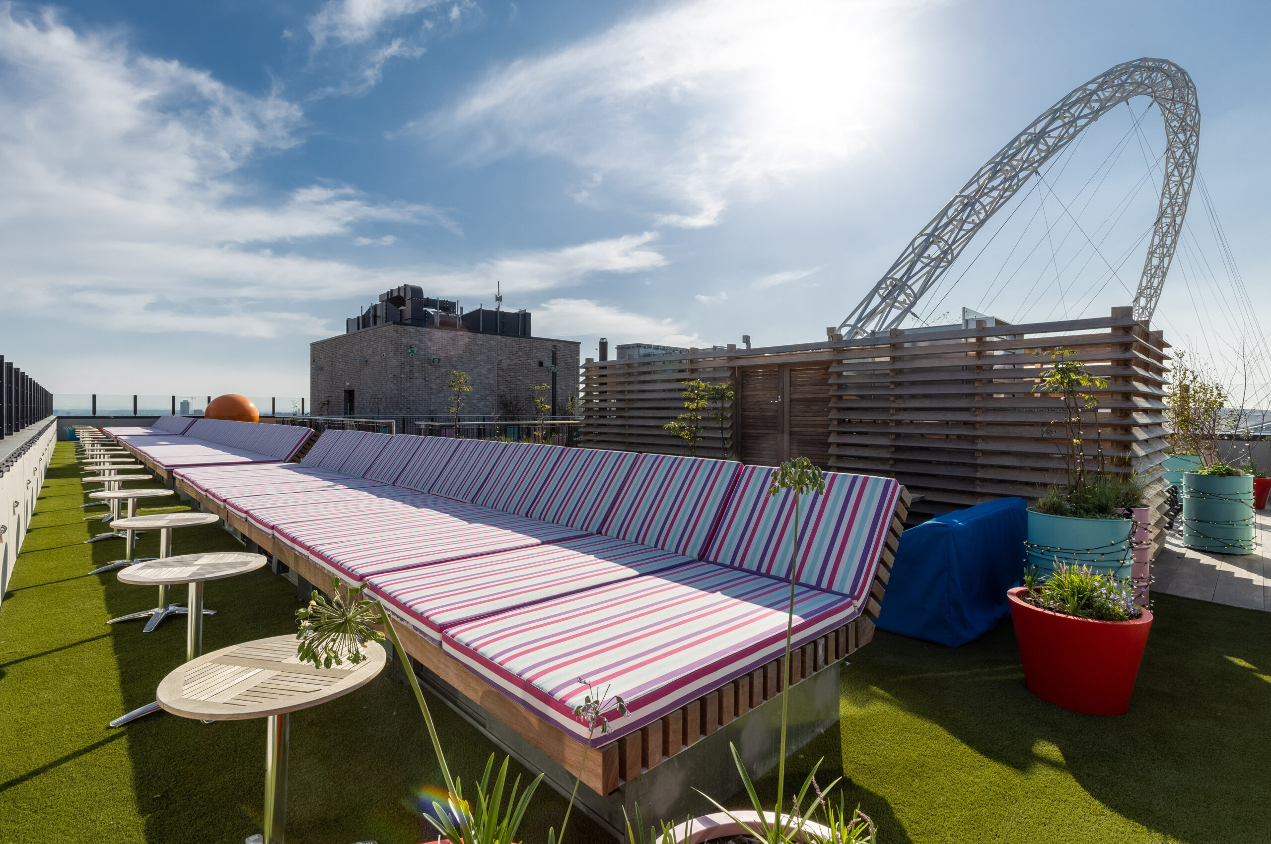 Fun in the sun on London’s longest row of sun loungers at Quintain ...