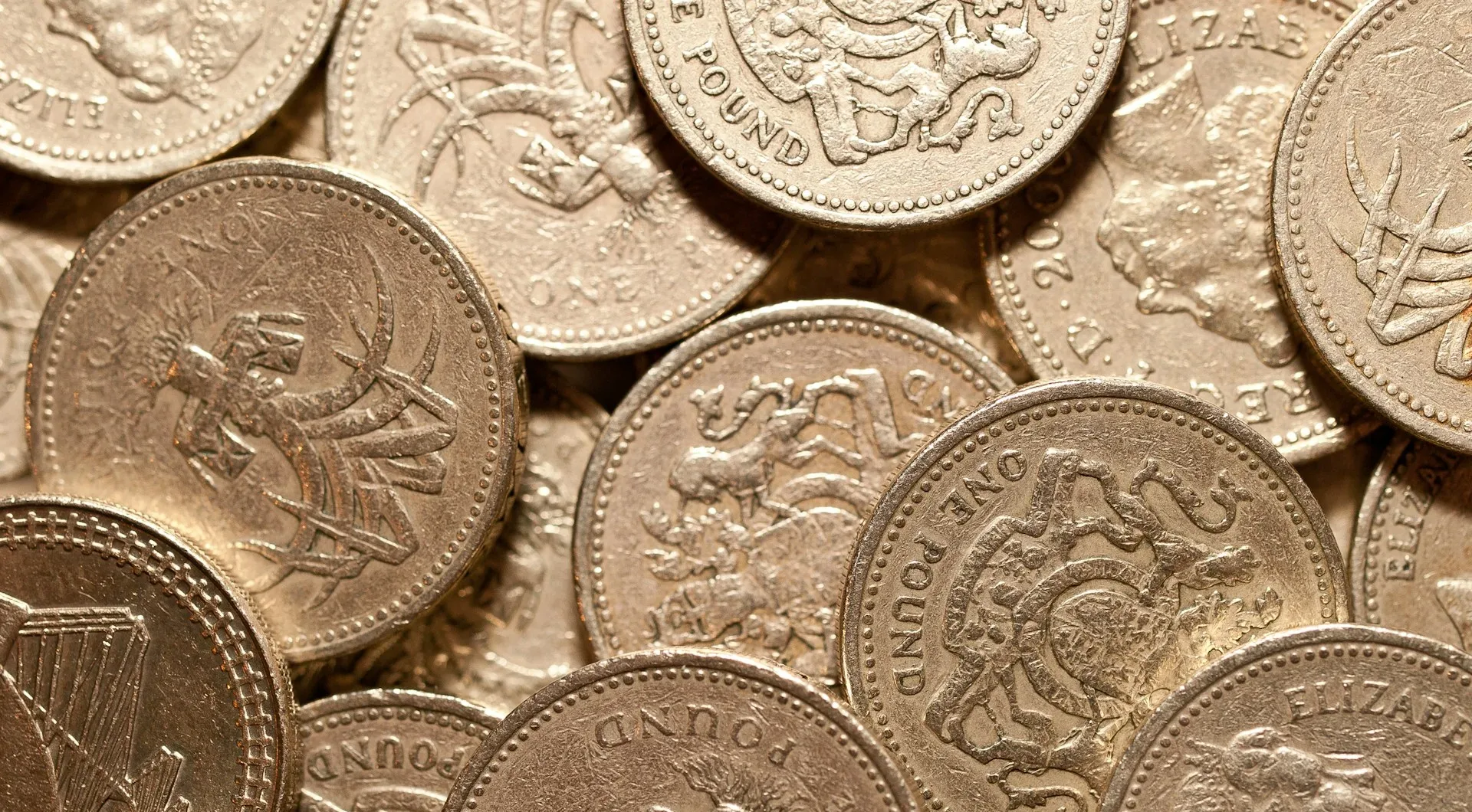 Pound slides to 14-month low as investors hit with bleak prediction ...
