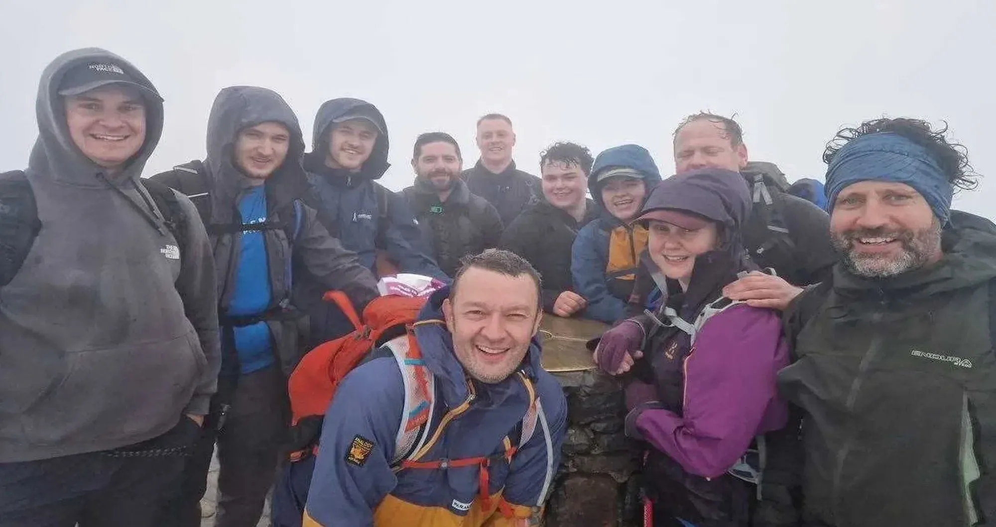 Over 100 people climb Snowdon at sunset for London charity supporting ...