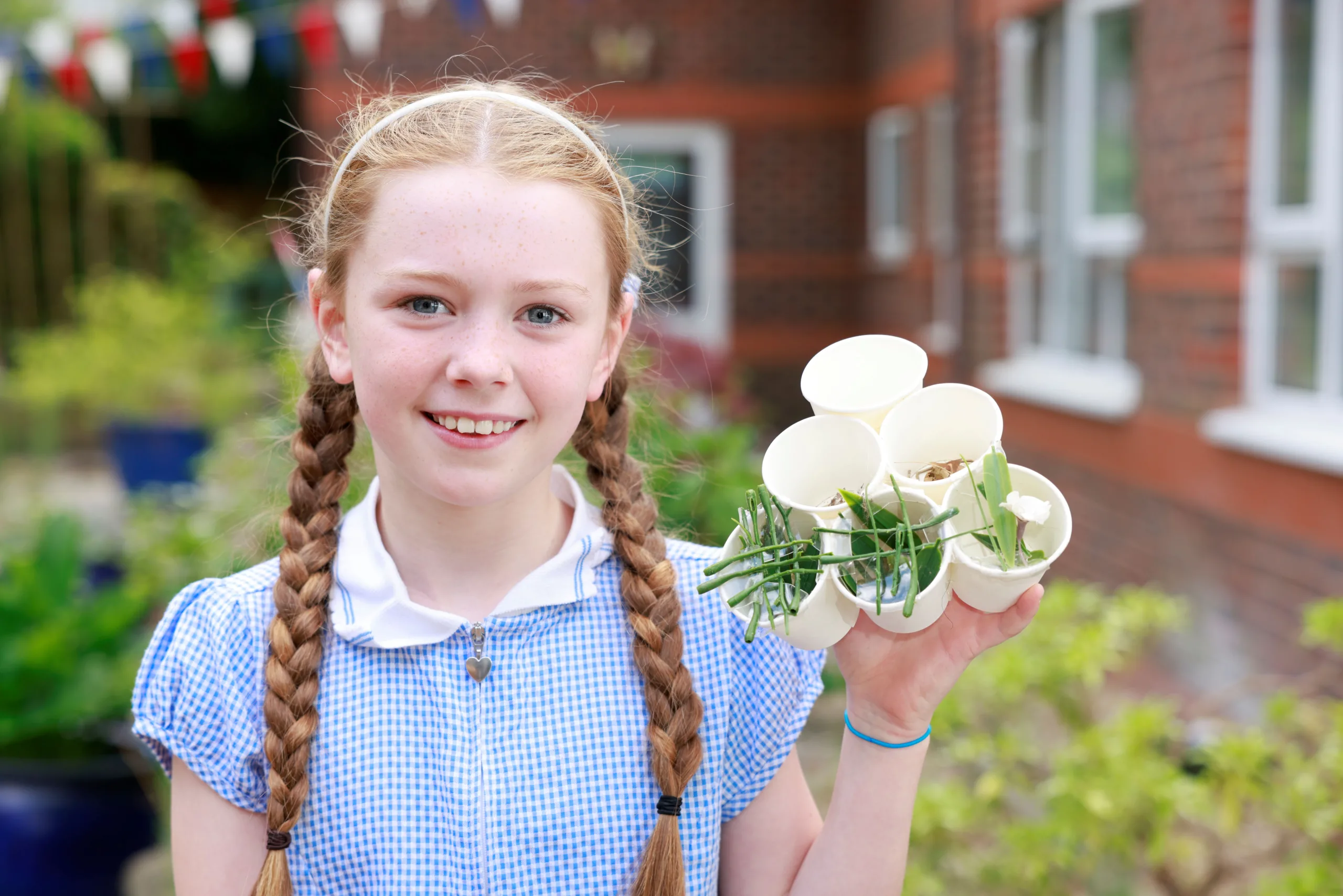 Holy Rood School pupils unveil bug hotel donated by Watford-based ...