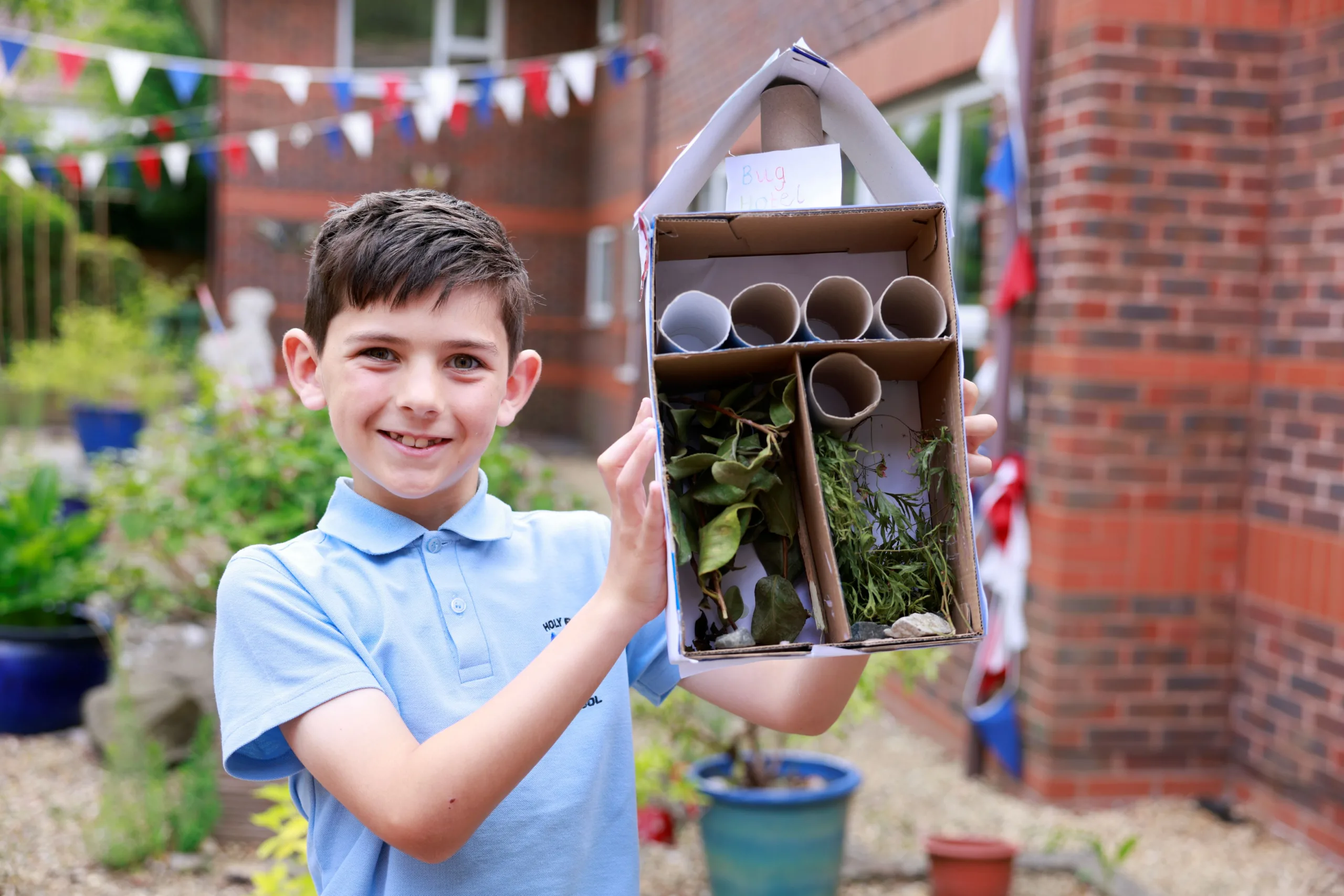 Holy Rood School pupils unveil bug hotel donated by Watford-based ...
